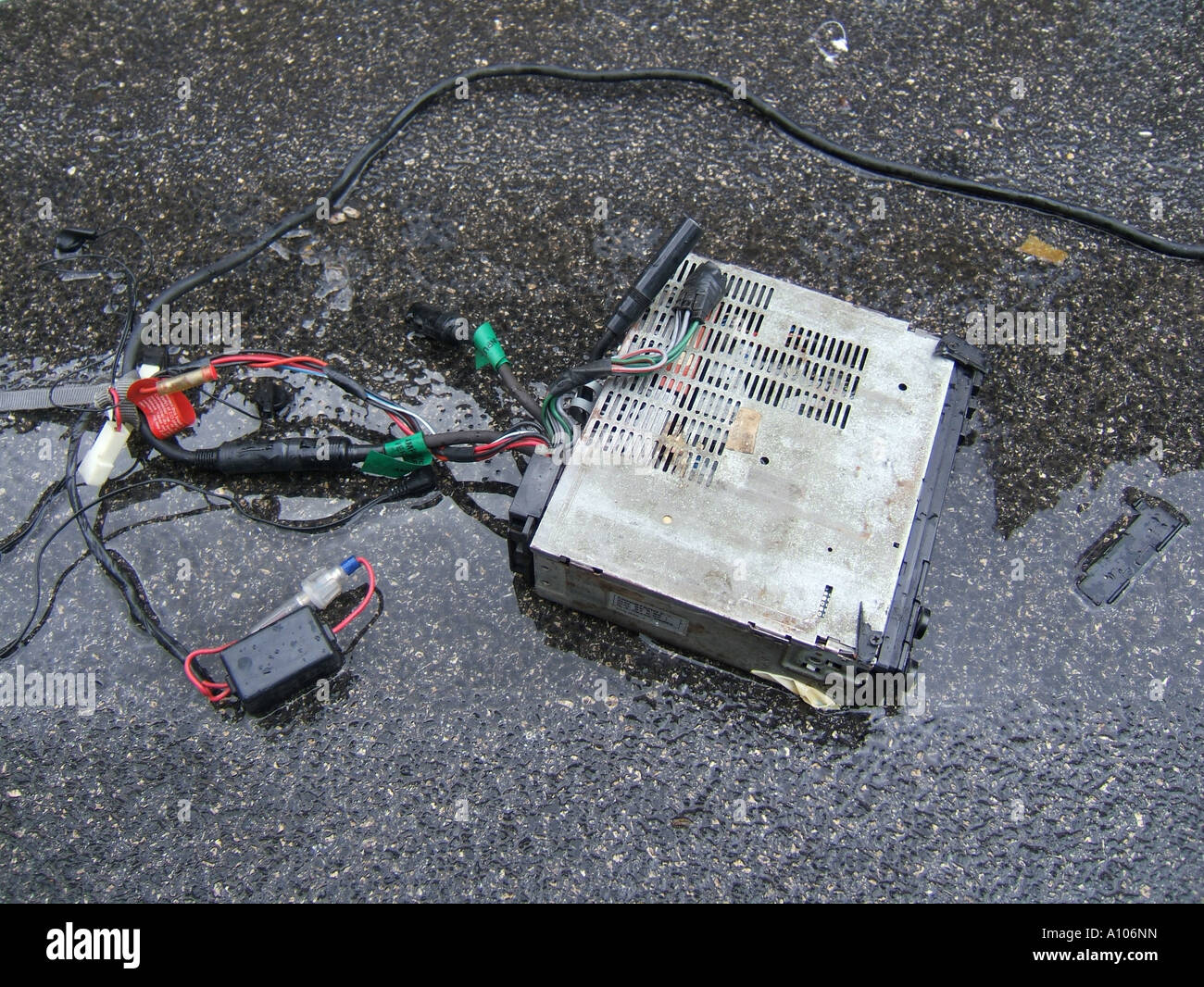 one old car stereo in pool of water on street Stock Photo - Alamy