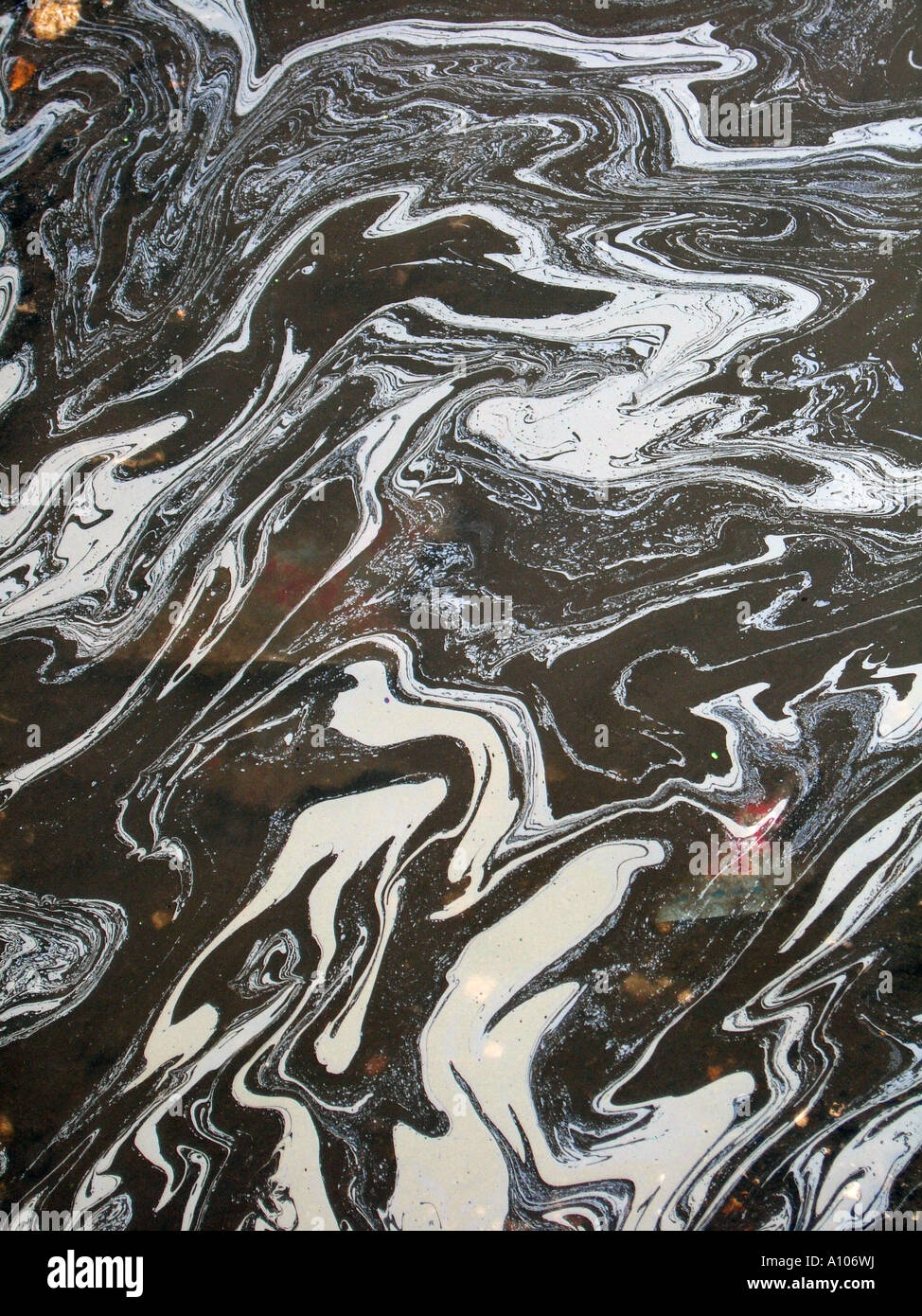 oil leak pattern on water surface Stock Photo - Alamy