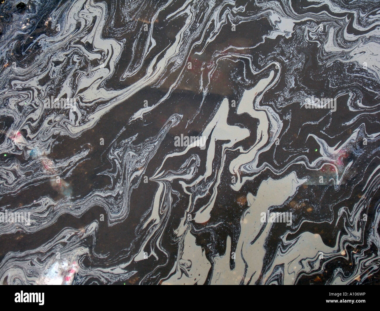 oil leak pattern on water surface Stock Photo - Alamy