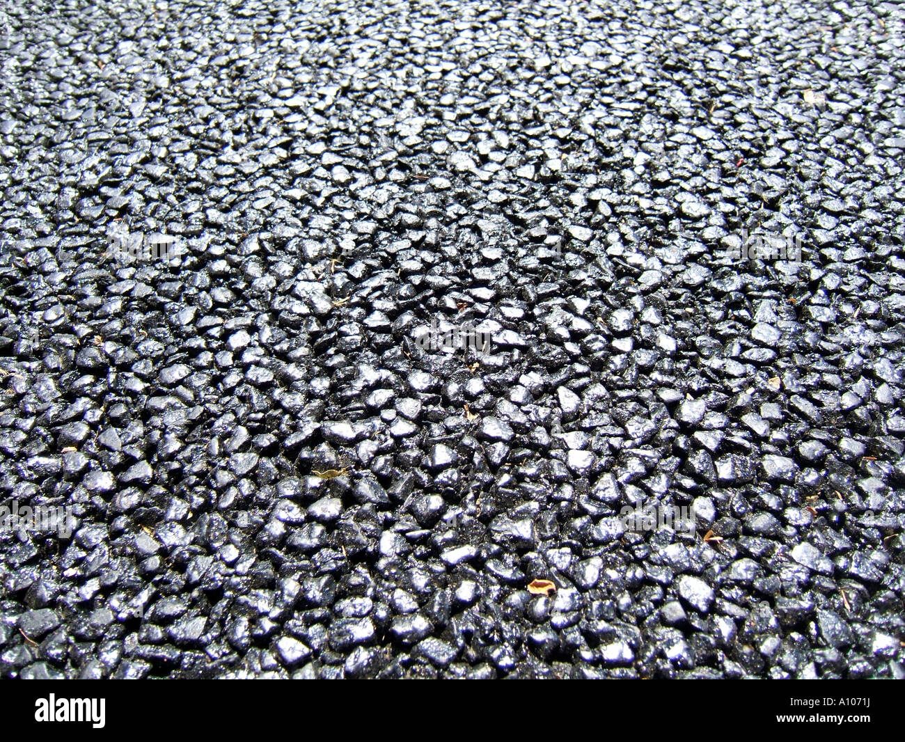 fresh tarmac on road surface Stock Photo - Alamy