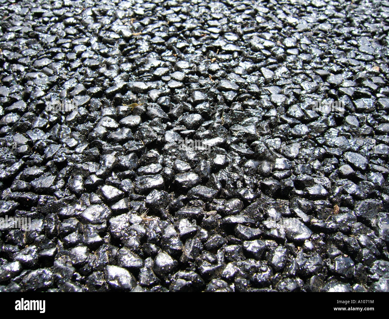 fresh tarmac on road surface Stock Photo - Alamy
