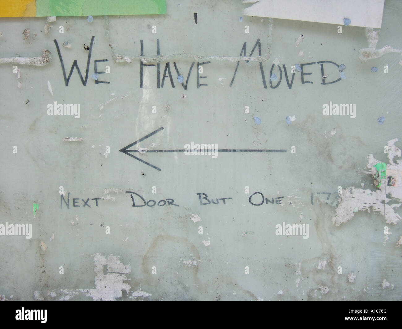 business relocation notice in shop window Stock Photo - Alamy