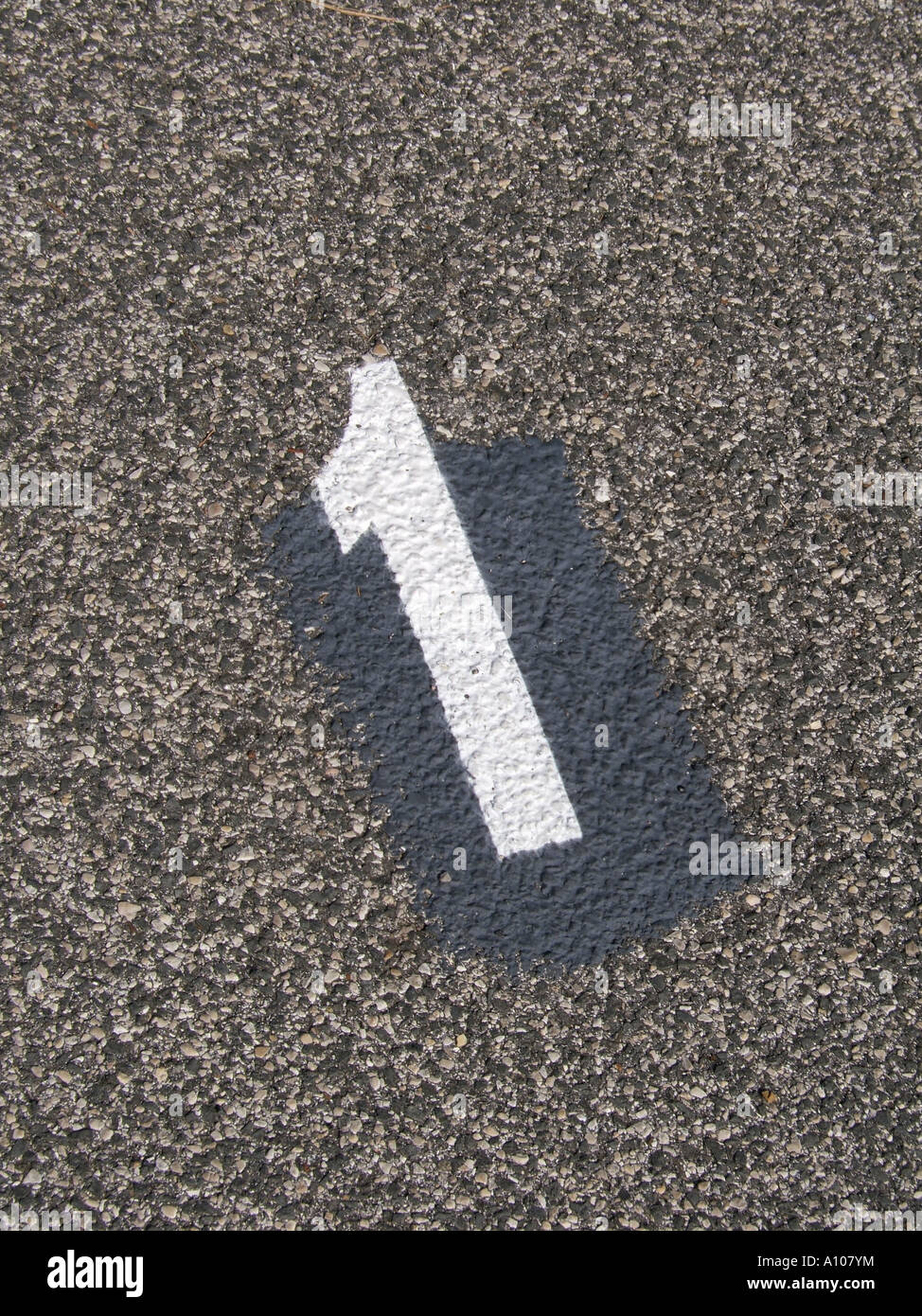 number one painted on road surface Stock Photo - Alamy