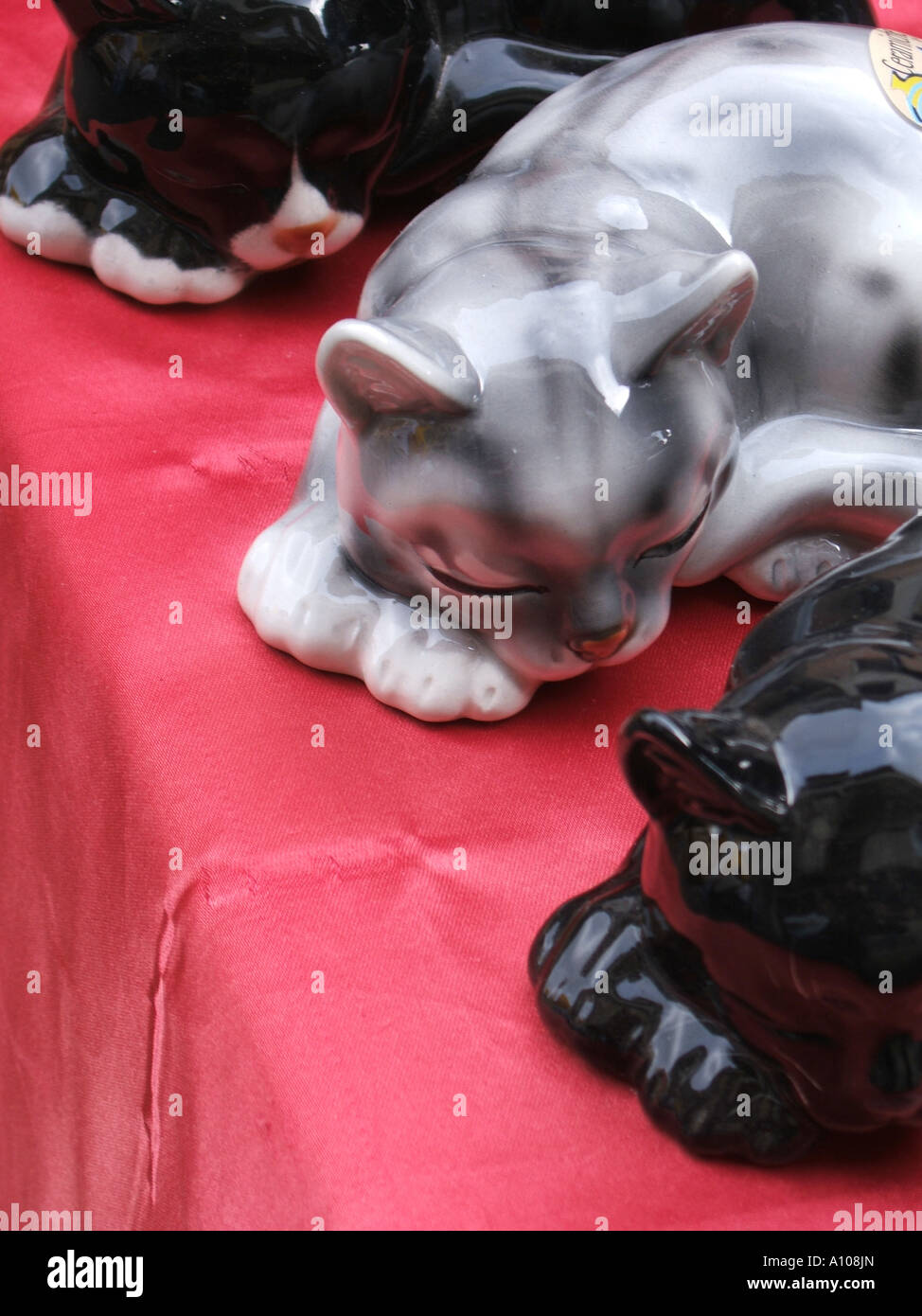 ornamental cats on market stand Stock Photo - Alamy