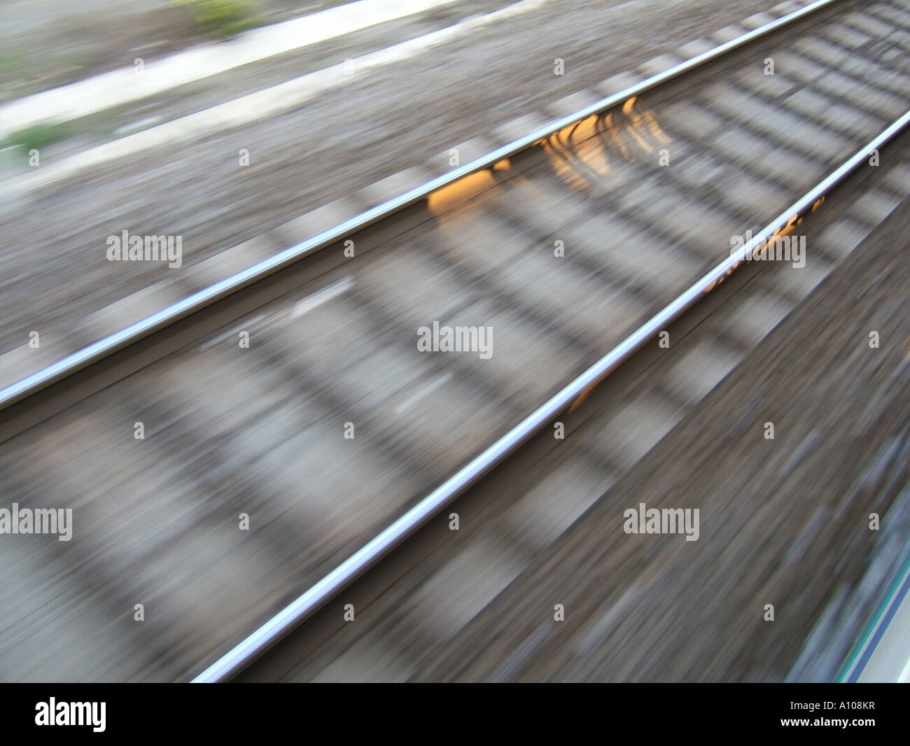view of train tracks sleepers from fast train window Stock Photo - Alamy