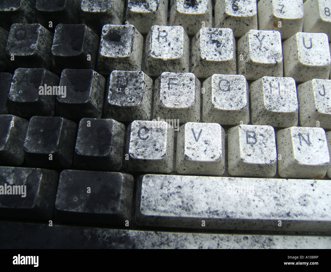 computer keyboard covered with black photocopier toner ink Stock Photo ...