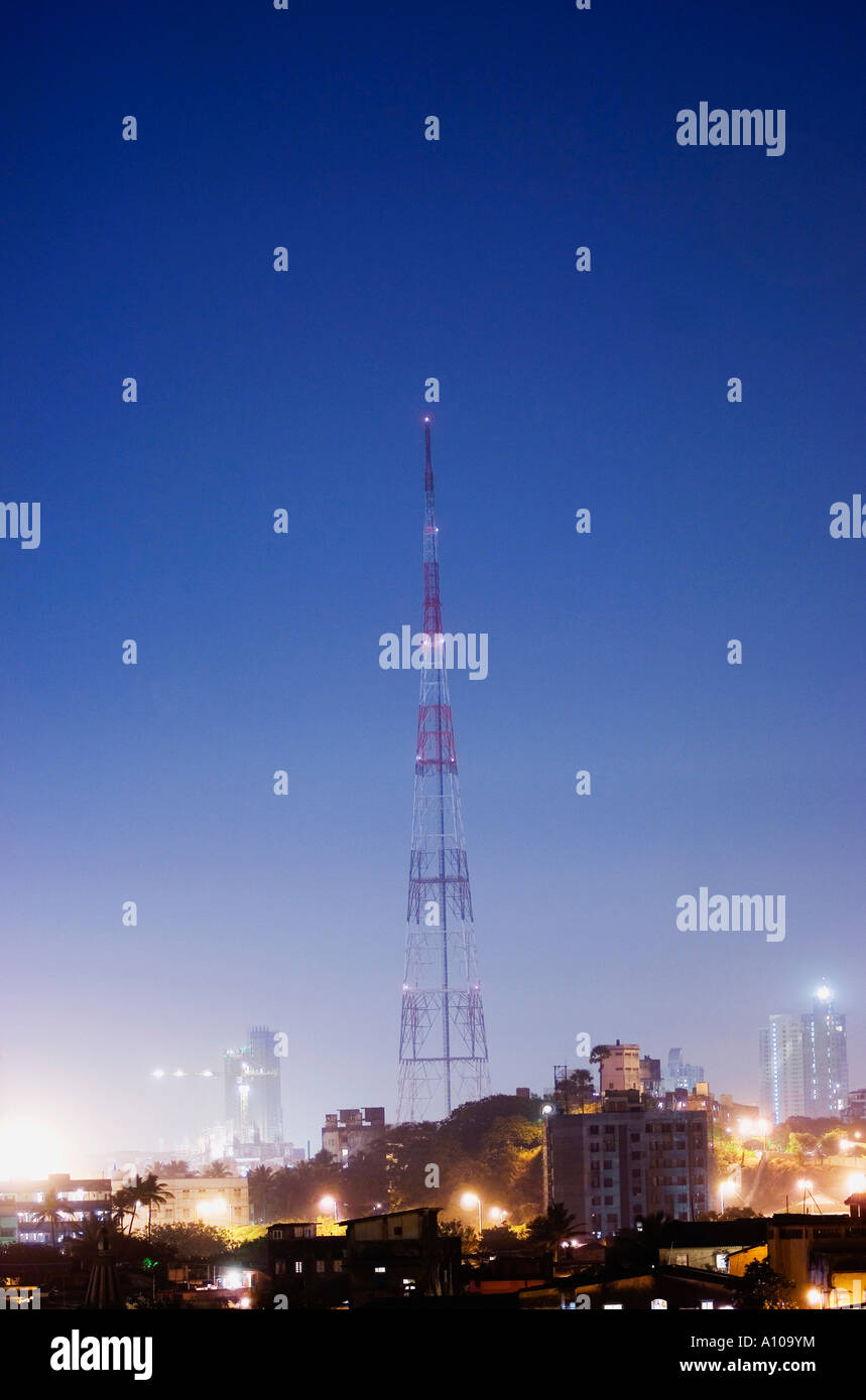 Buildings and a tower lit up at night, Mumbai, Maharashtra, India Stock ...