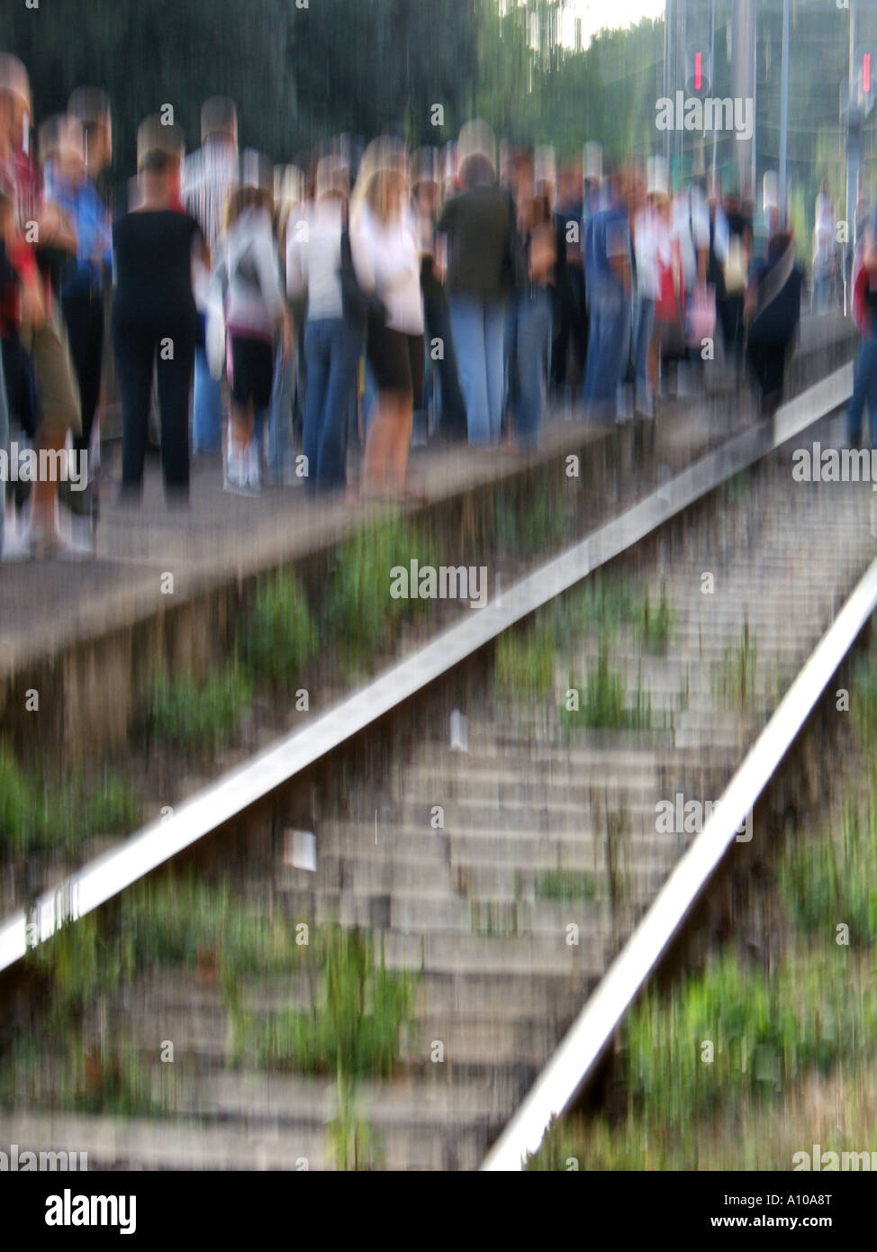 passengers waiting for train on platform Stock Photo - Alamy