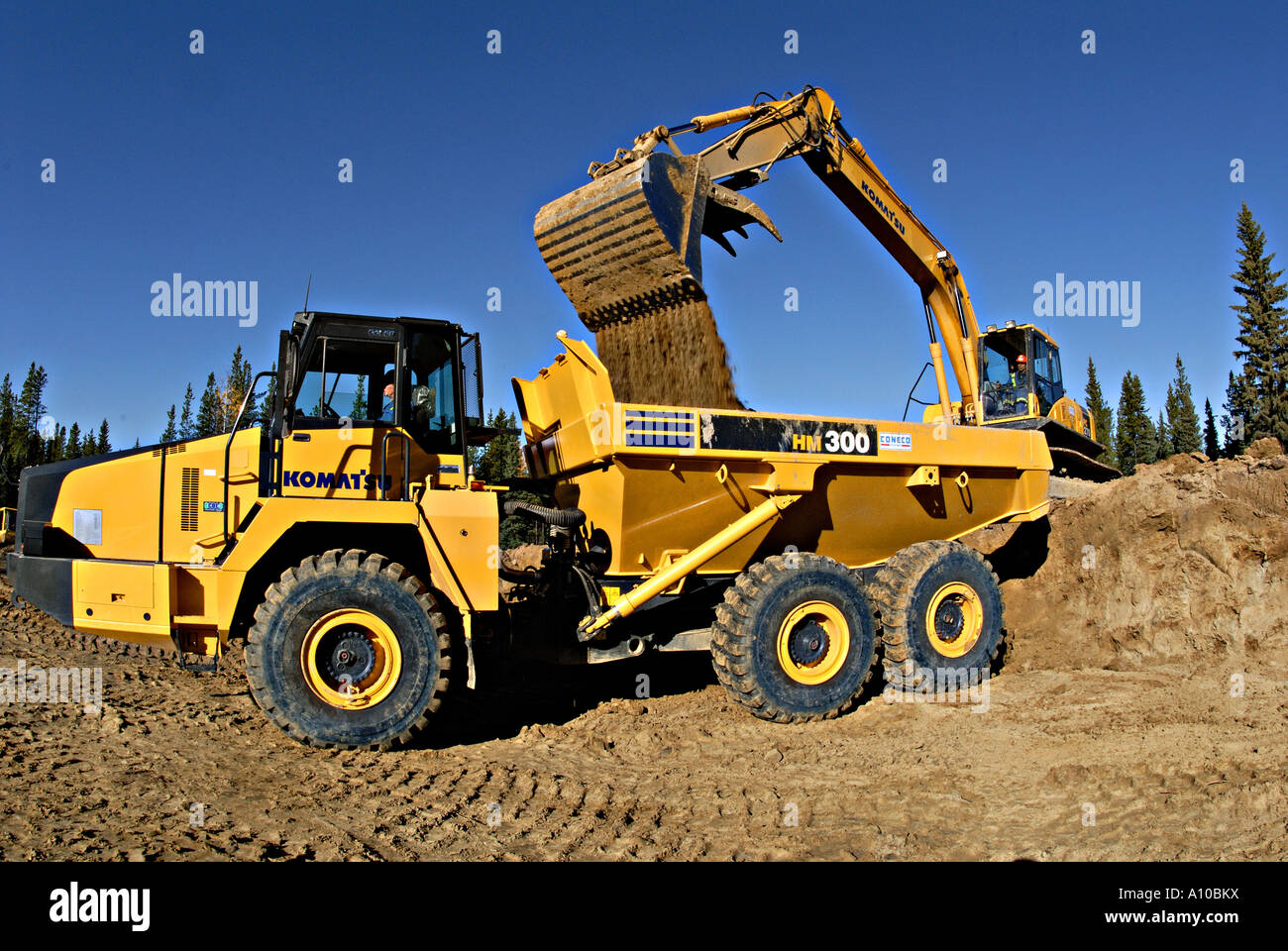 Truck getting loaded Stock Photo - Alamy
