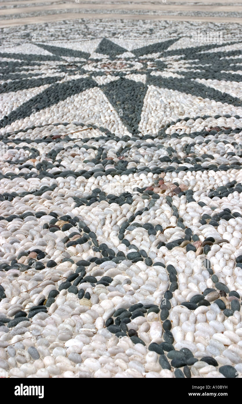 floor of black and white pebble stones in the kalymnos Island in Greece ...