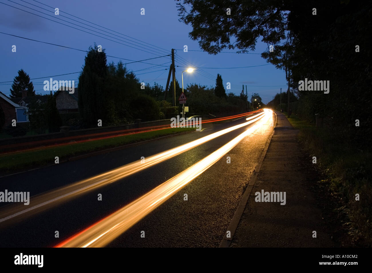 trails of light from a passing car Stock Photo - Alamy