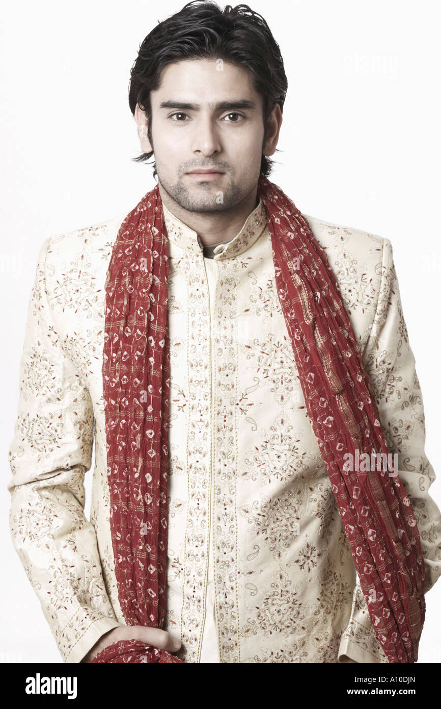 Portrait of a young man in traditional clothing Stock Photo - Alamy