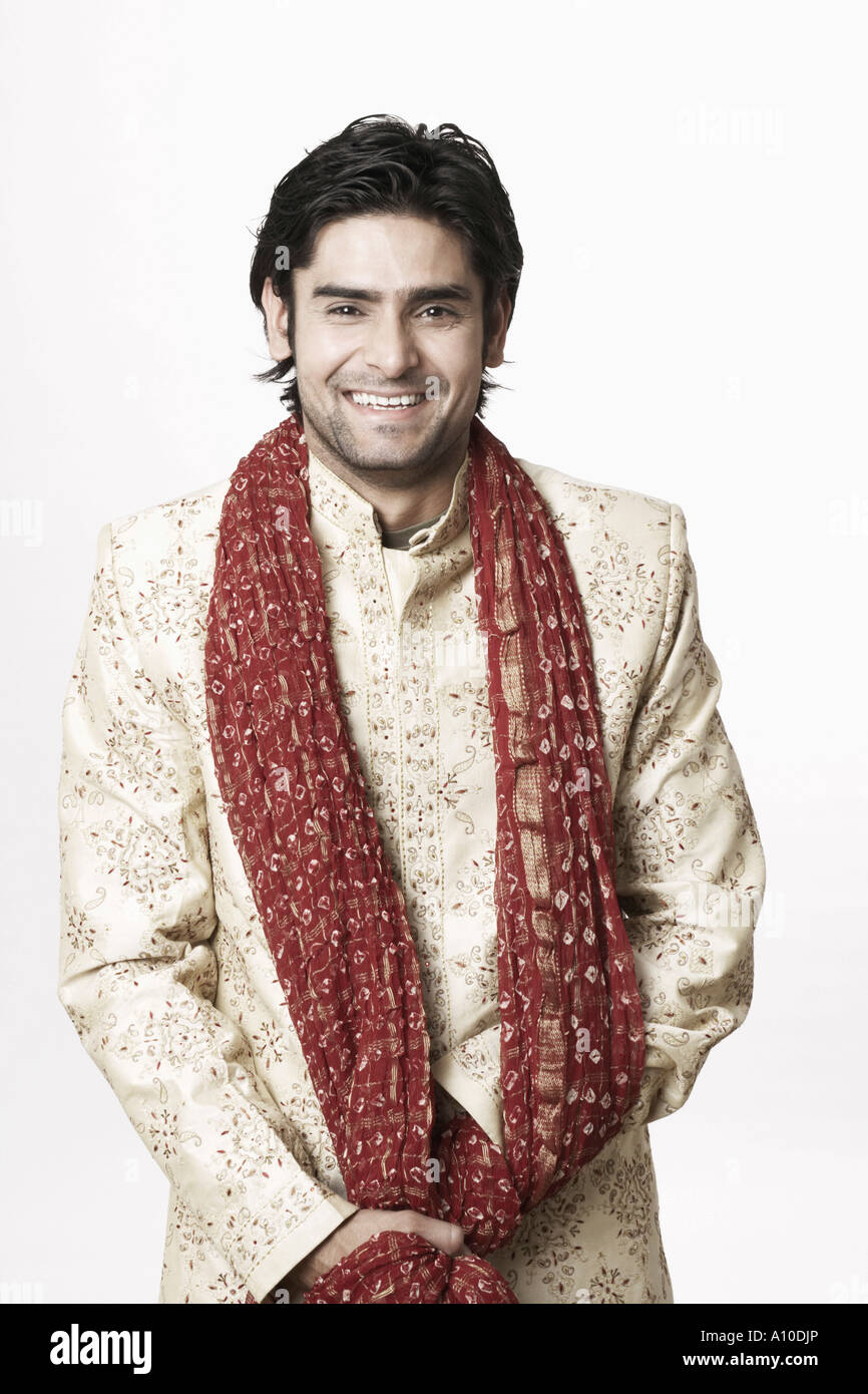Portrait of a young man in traditional clothing Stock Photo - Alamy