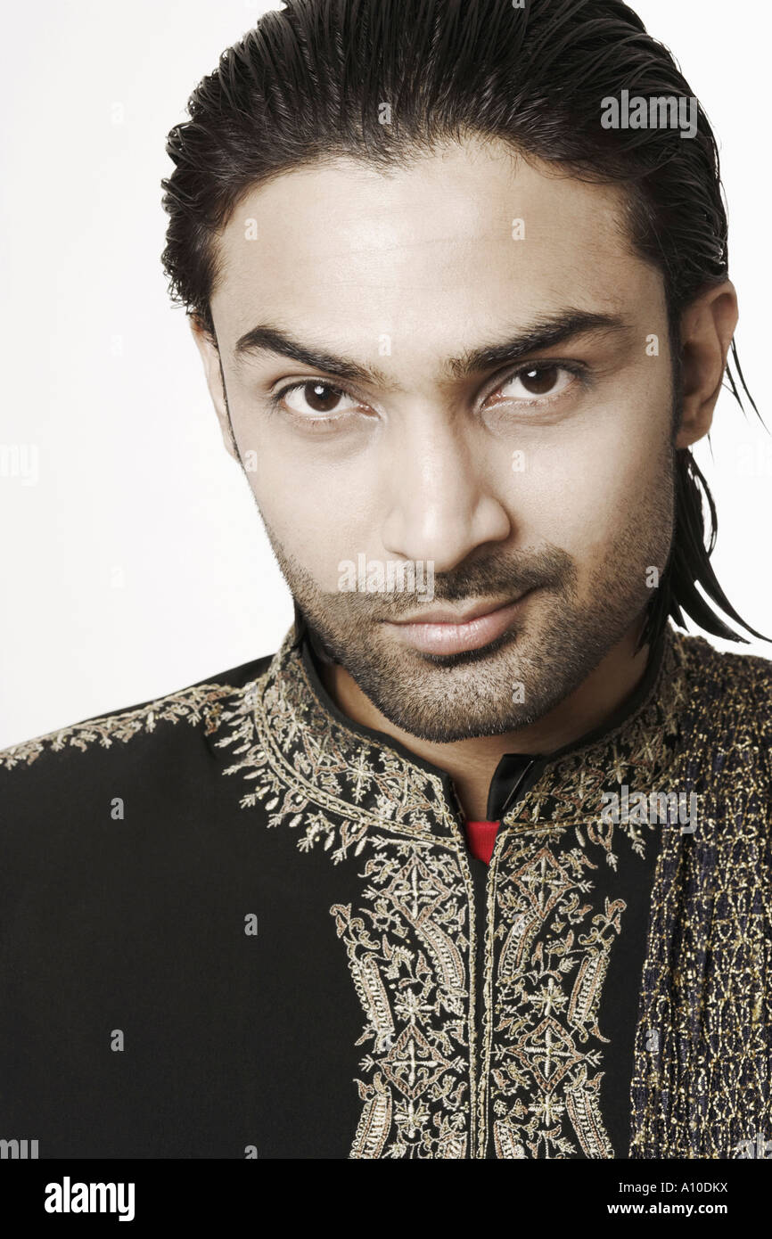 Portrait of a young man in traditional clothing Stock Photo - Alamy
