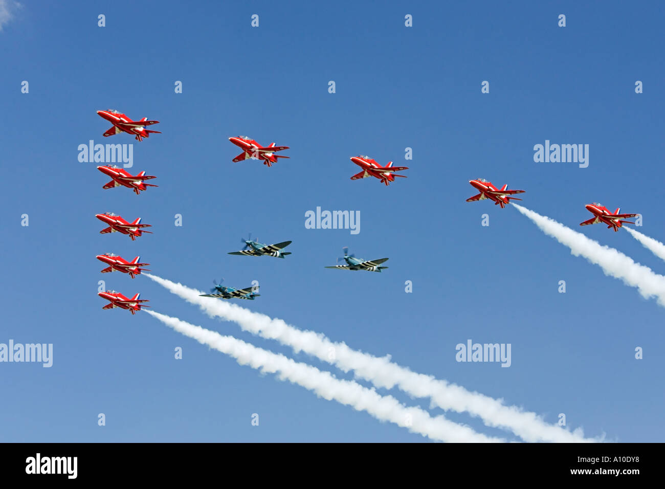 Spitfire with red arrows hi-res stock photography and images - Alamy