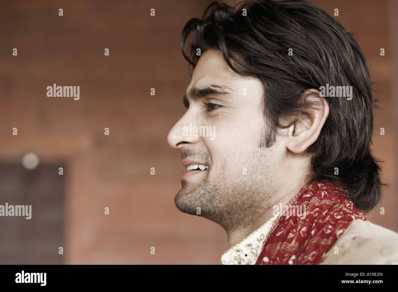 Indian man smiling side profile hi-res stock photography and images - Alamy