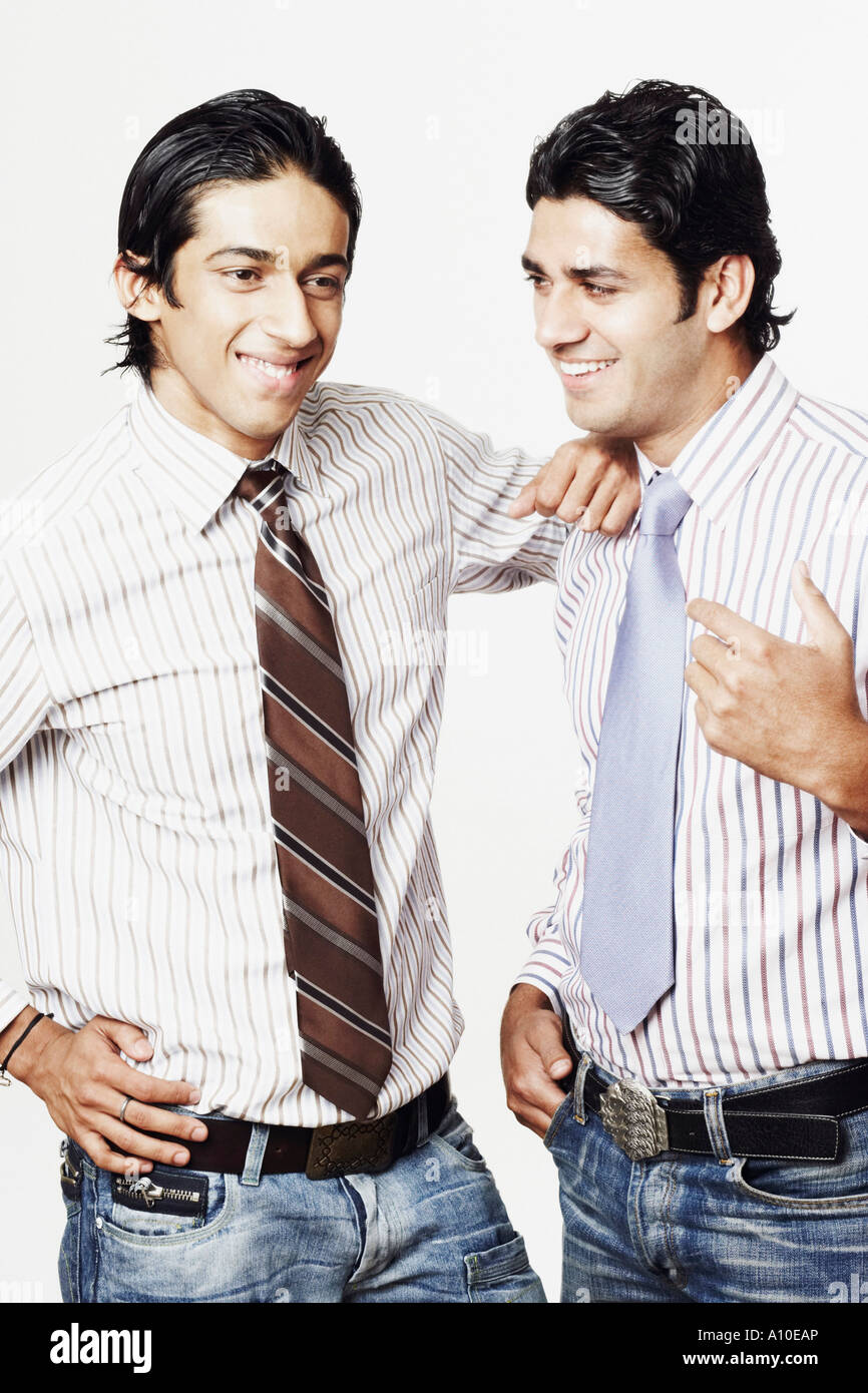 Two businessmen talking Stock Photo - Alamy