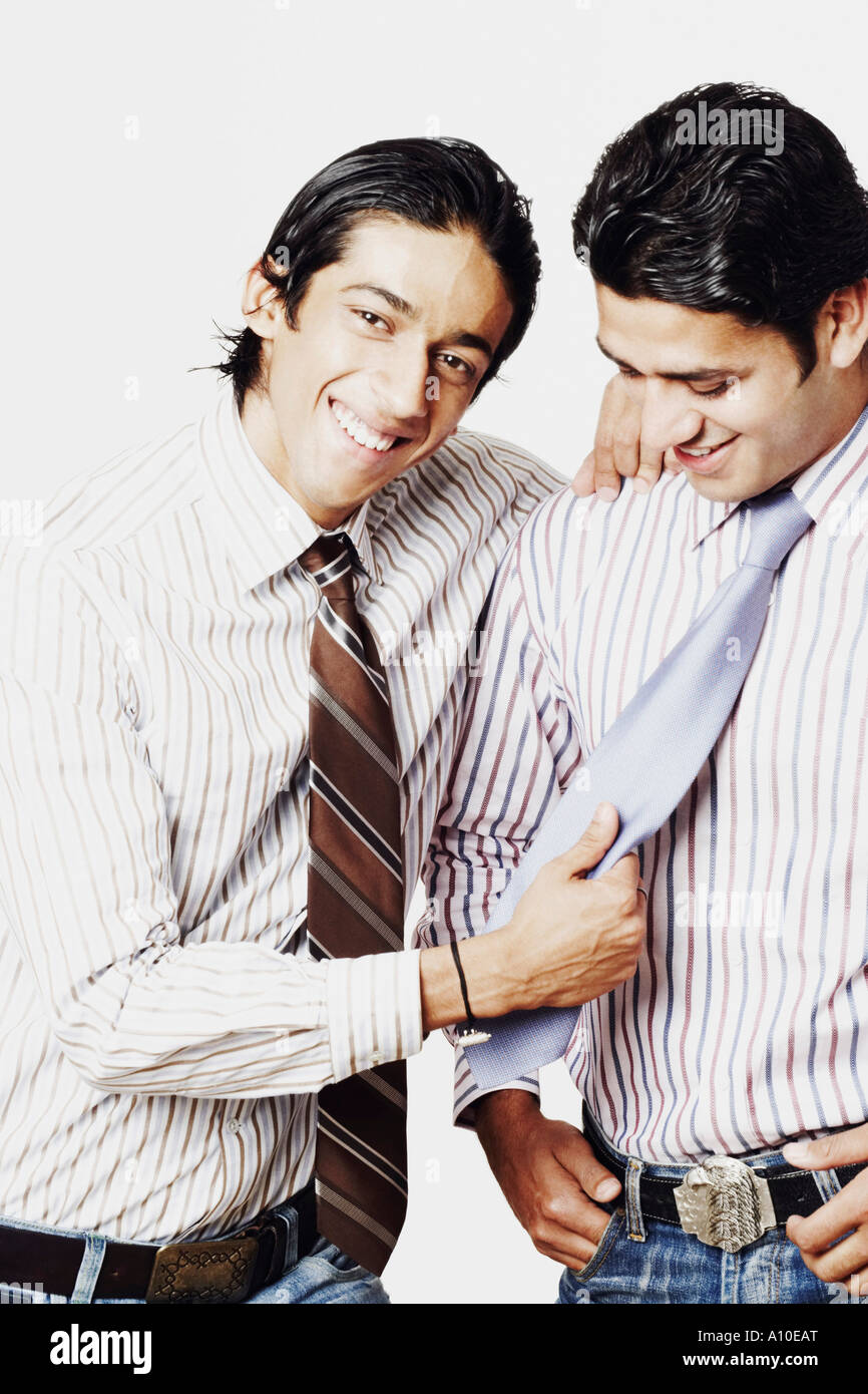 Portrait of a businessman pulling another businessman's tie Stock Photo ...