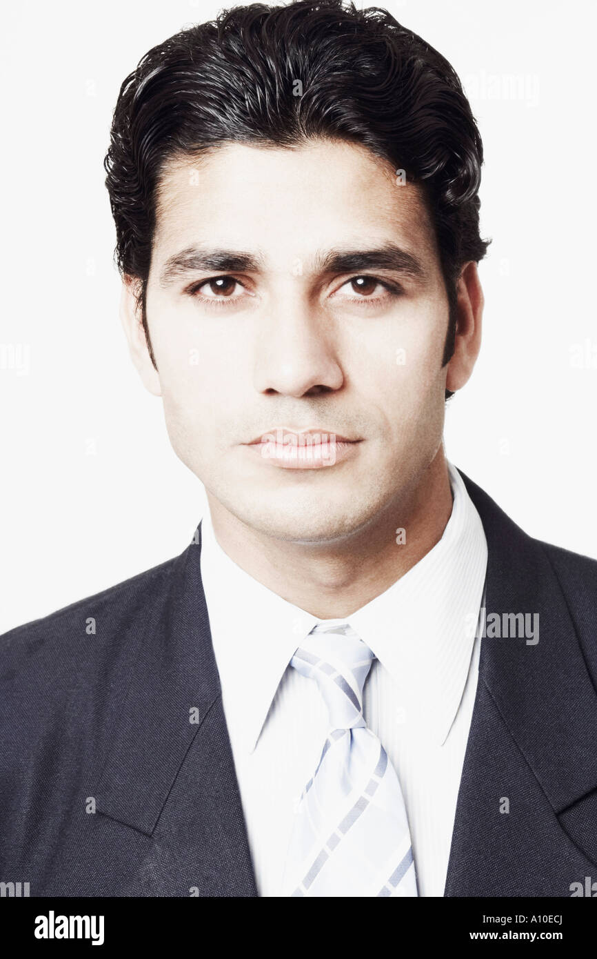 Portrait of a businessman looking serious Stock Photo - Alamy