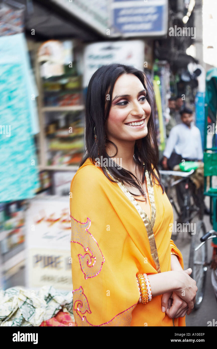 Side profile of a young woman smiling Stock Photo - Alamy