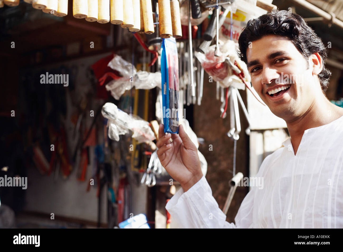 Indian man holding packet indian hi-res stock photography and images ...