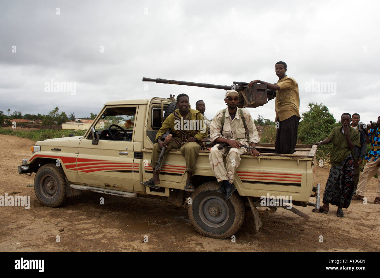Somali militia on a Technical support vehicle fitted with 12.7mm anti ...