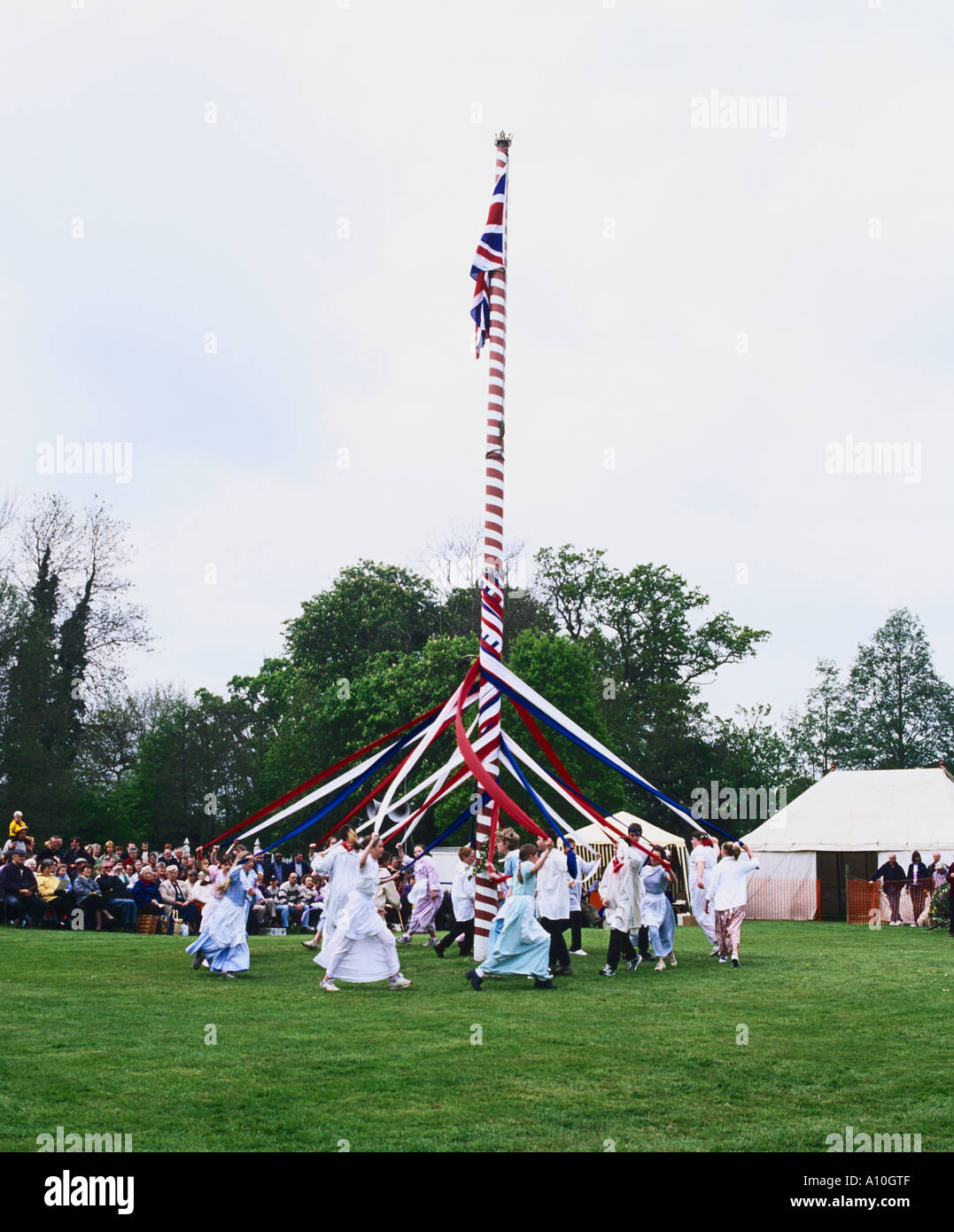 Dance around maypole traditional costume hi-res stock photography and ...