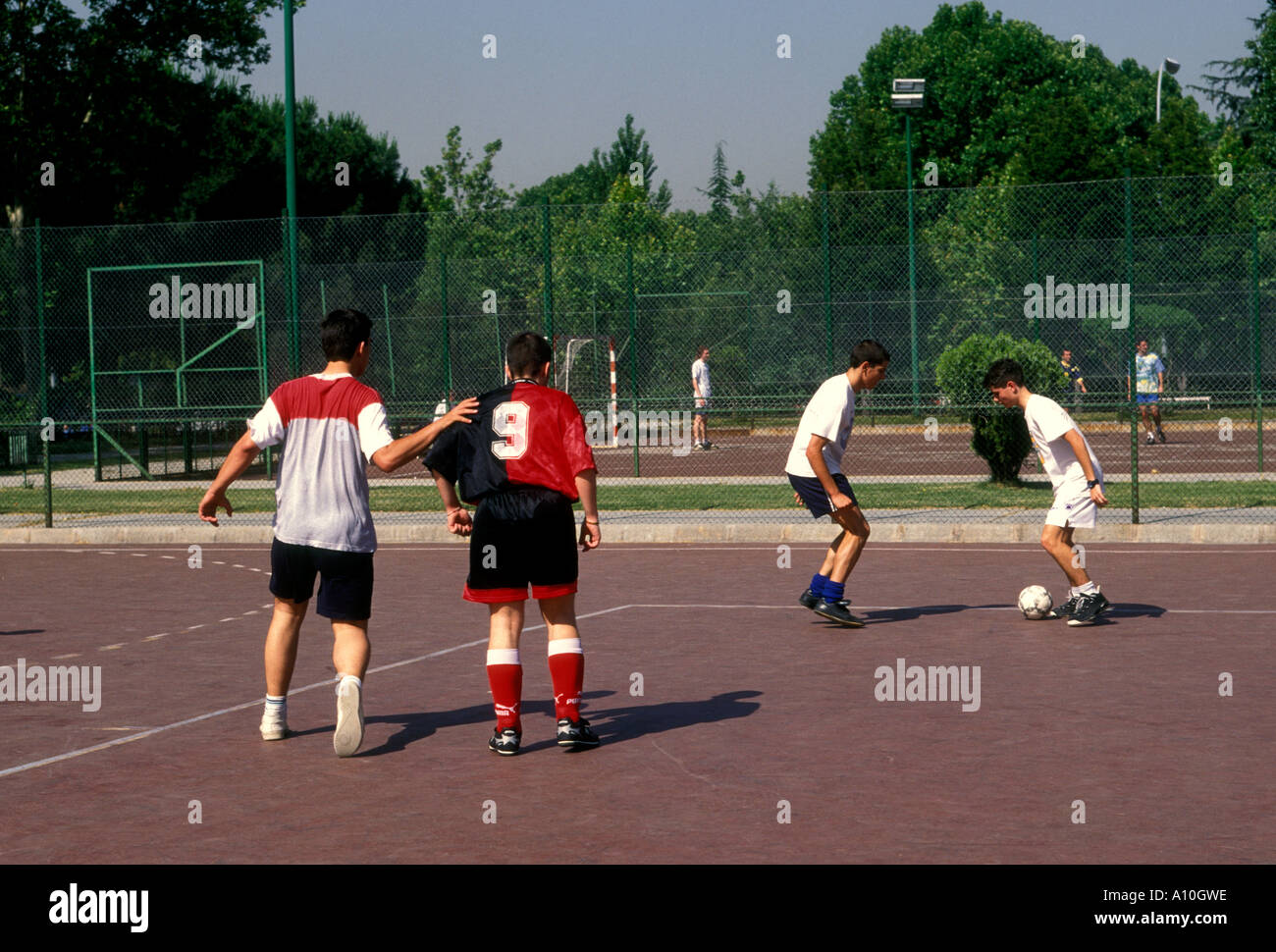 Spaniards, Spanish students, soccer players, playing soccer, campus ...