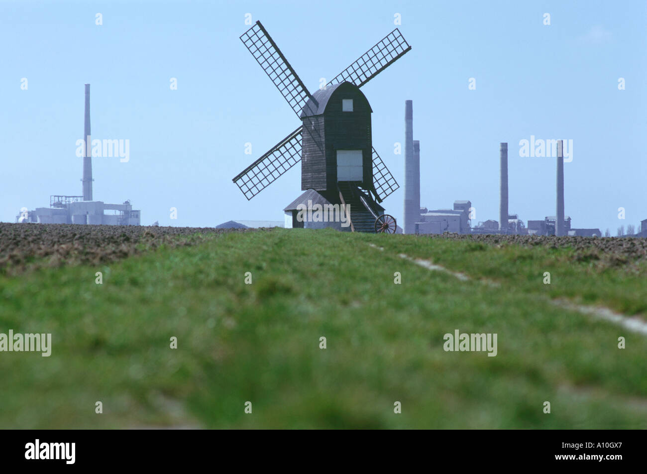 Pitstone Windmill dates from 1627 with modern cement works behind near ...