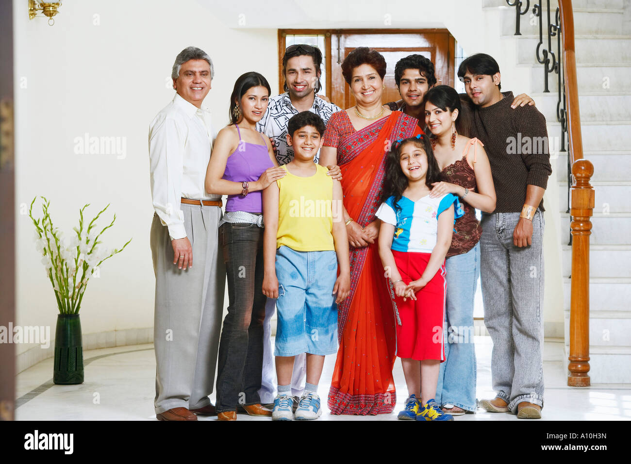 Portrait of a family standing together Stock Photo - Alamy