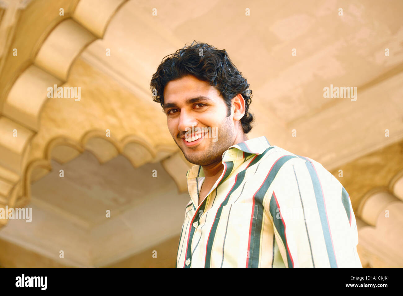Portrait of a young man smiling Stock Photo - Alamy
