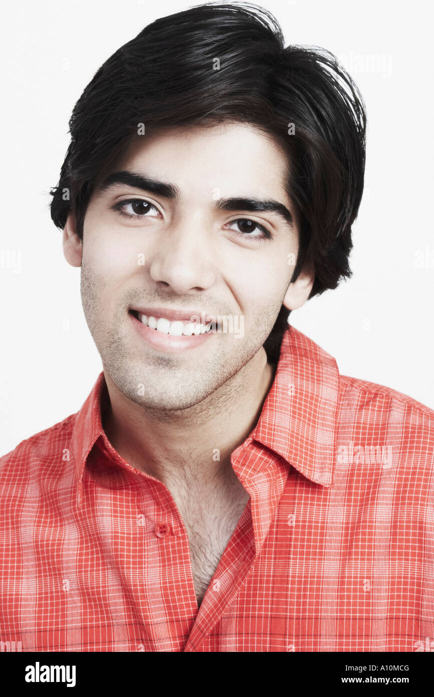 Portrait of a young man smiling Stock Photo - Alamy