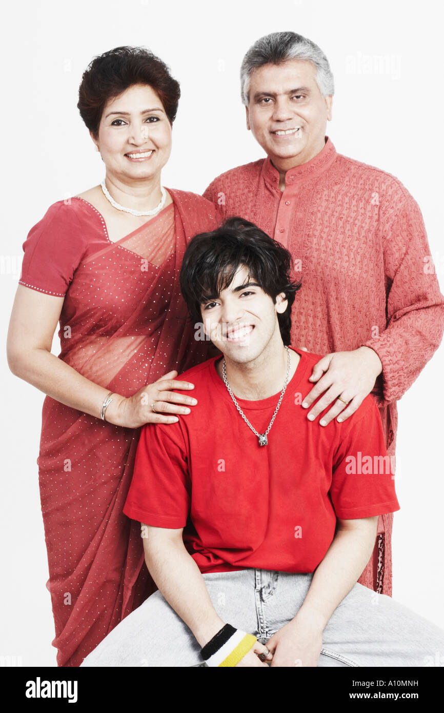 Portrait of parents and their son smiling Stock Photo - Alamy
