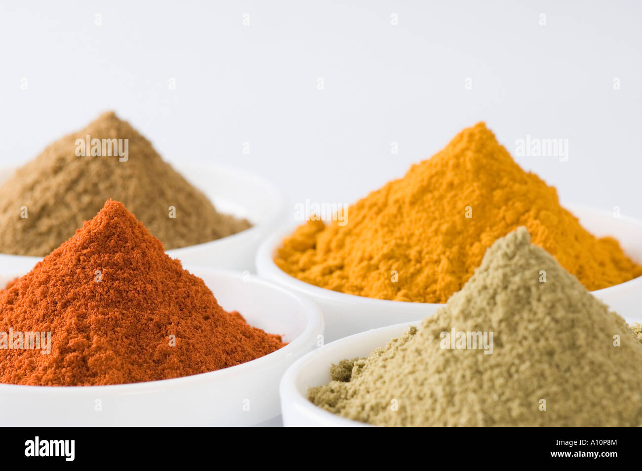 Close-up of four bowls of spices Stock Photo - Alamy