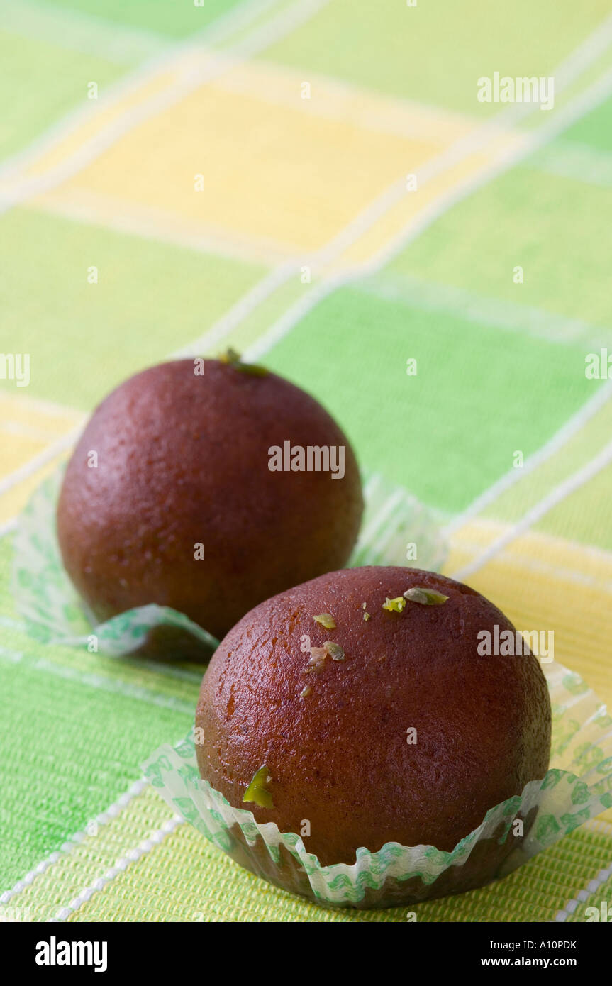 Close-up of two Gulab Jamuns Stock Photo - Alamy