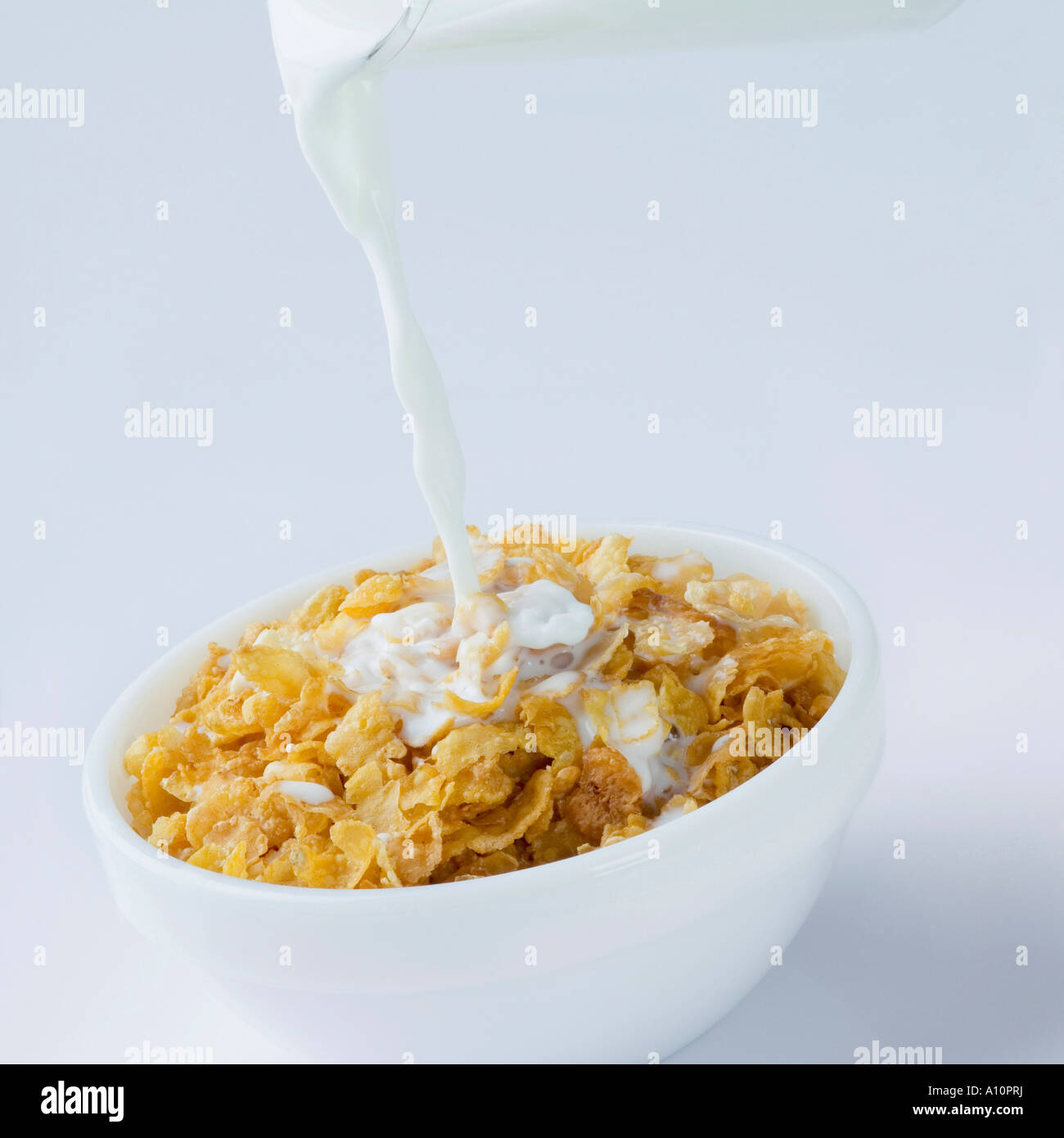 Pouring milk corn flakes colour hi-res stock photography and images - Alamy