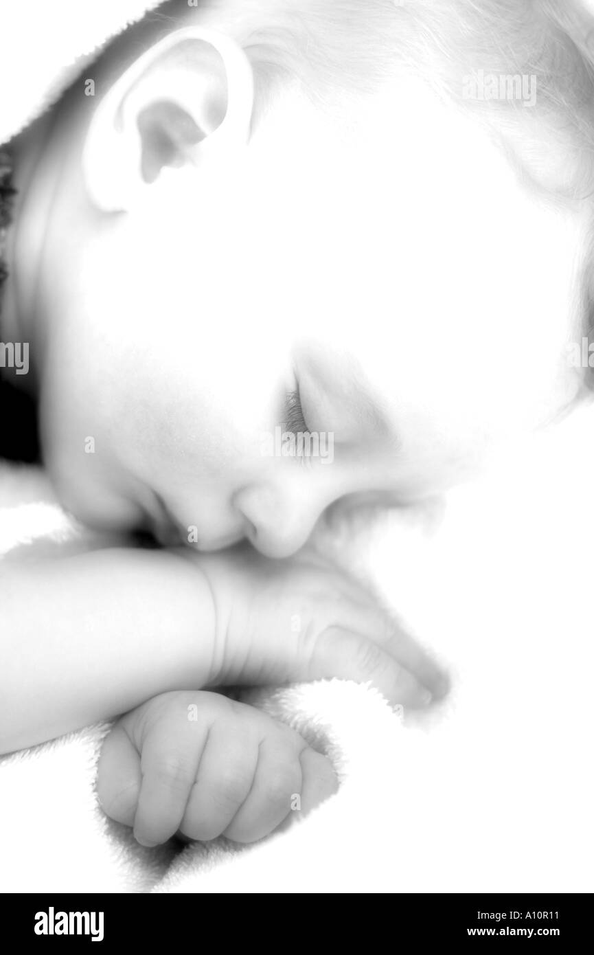 sleeping baby / white terry cloth Stock Photo - Alamy