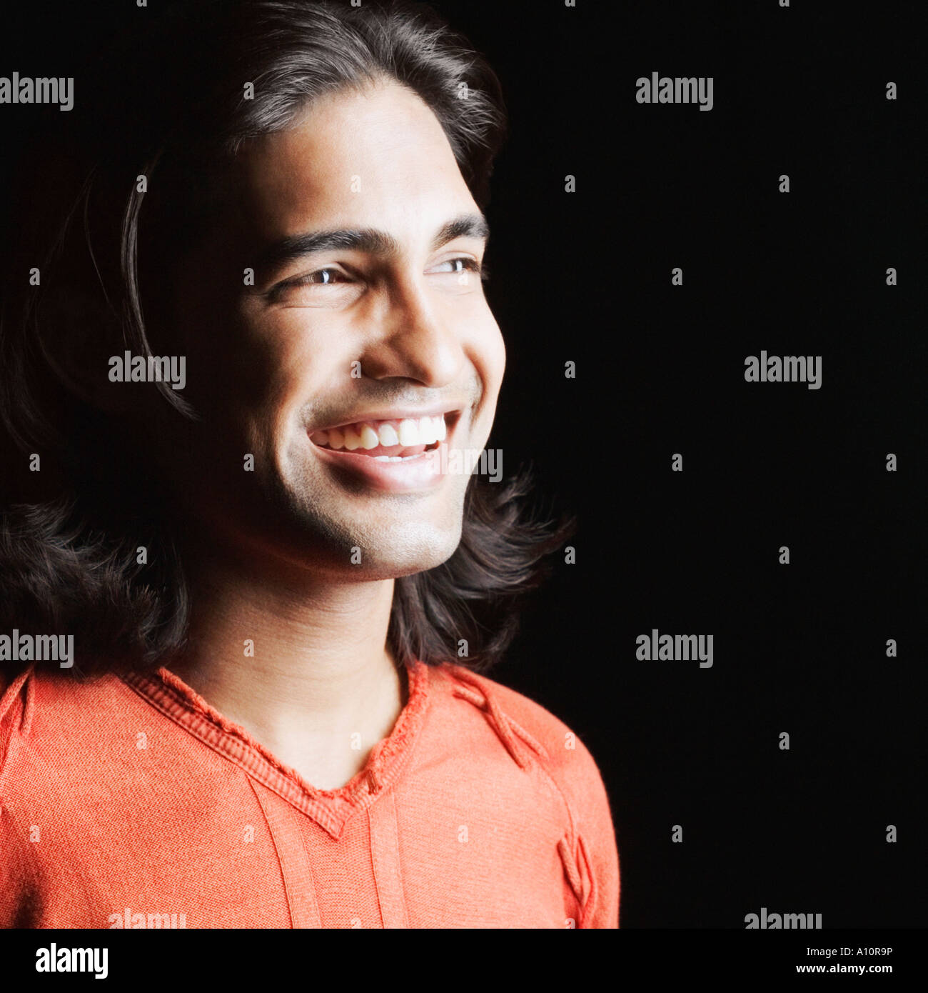Close-up of a young man smiling Stock Photo - Alamy