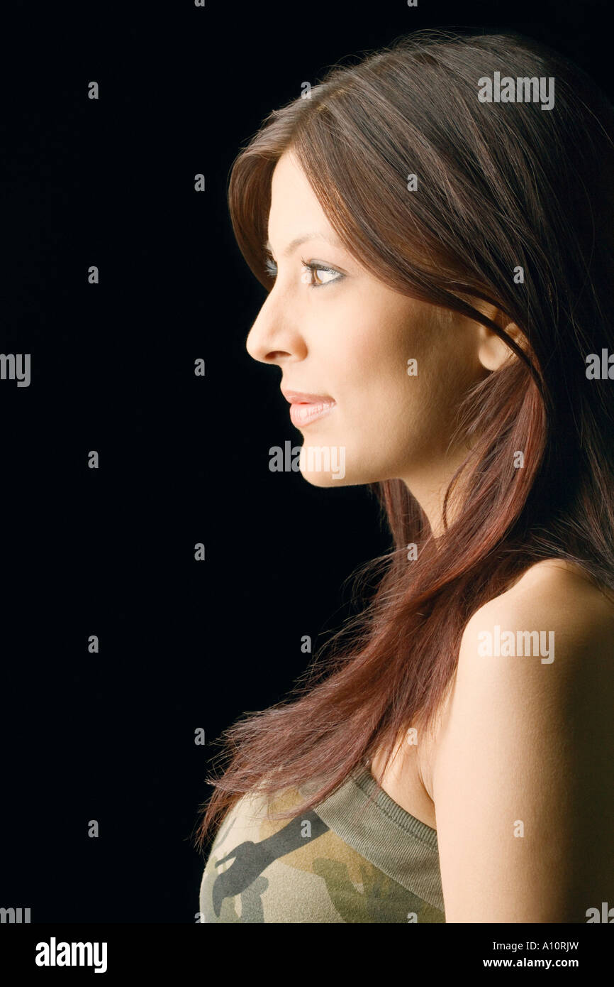 Side profile of a young woman Stock Photo - Alamy