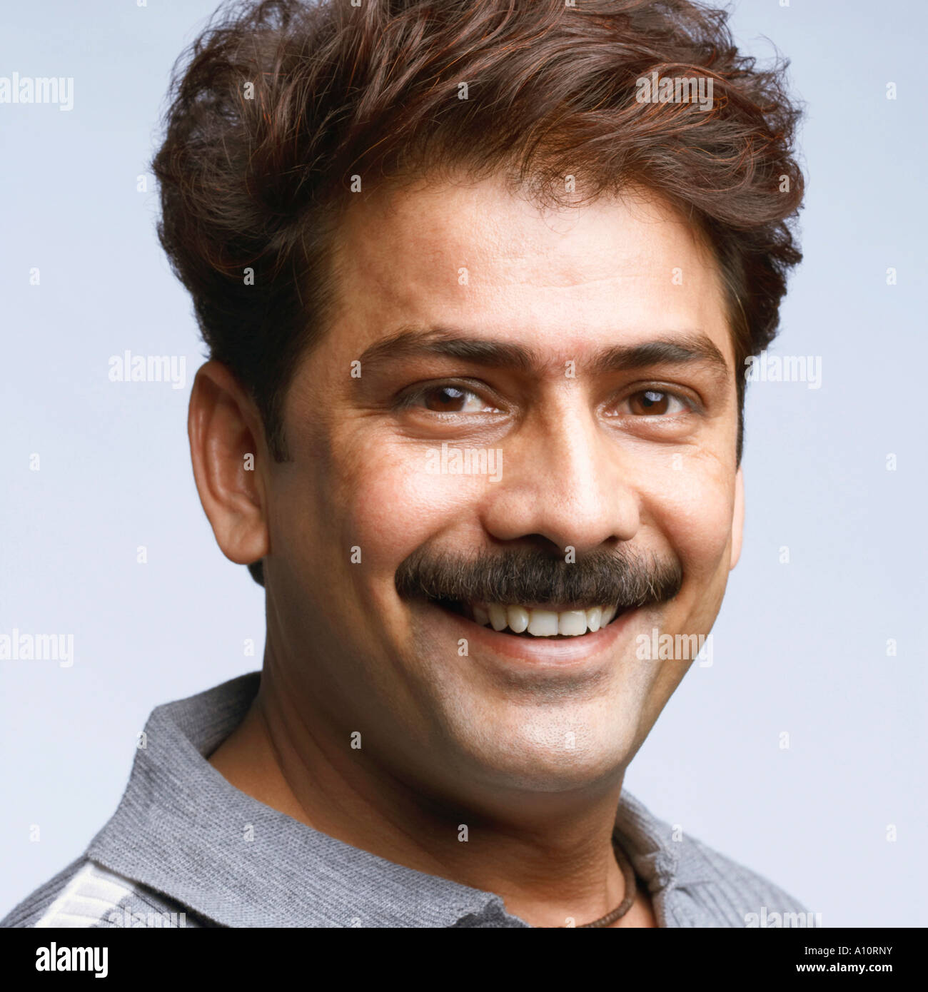 Portrait of a mid adult man smiling Stock Photo - Alamy