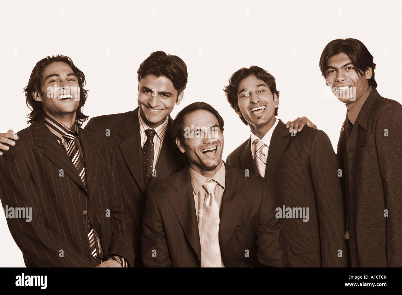 Portrait of five businessmen laughing Stock Photo - Alamy