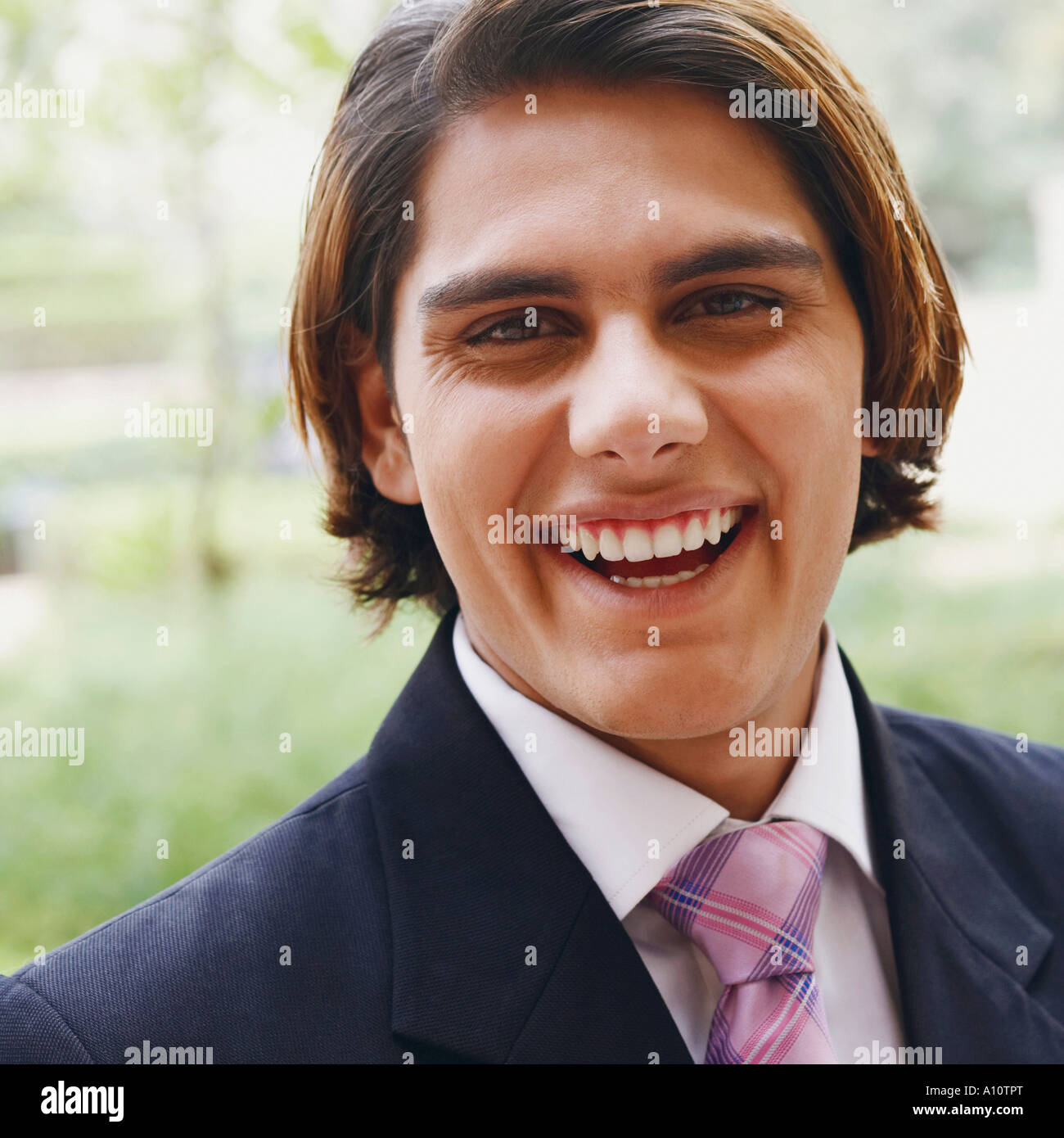 Portrait of a businessman smiling Stock Photo - Alamy