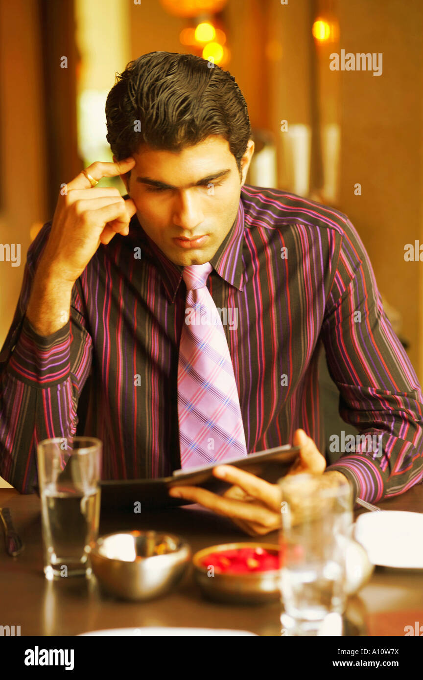 Menu contemplation hi-res stock photography and images - Alamy