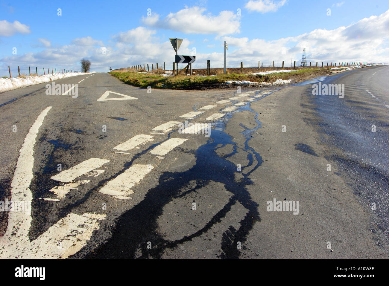 Junction in country lane Stock Photo - Alamy