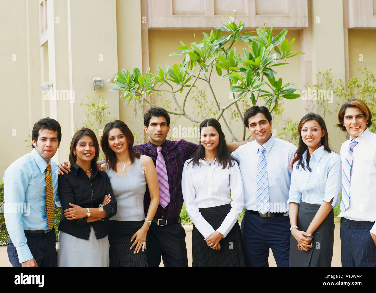Portrait of a group of business executives smiling Stock Photo - Alamy