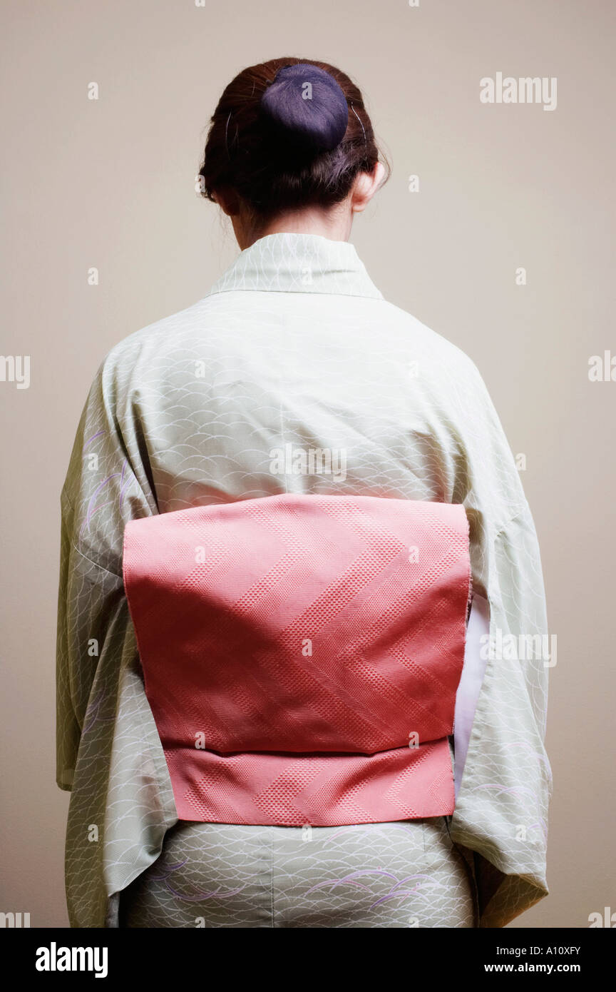 Rear view of a young woman wearing a kimono Stock Photo - Alamy