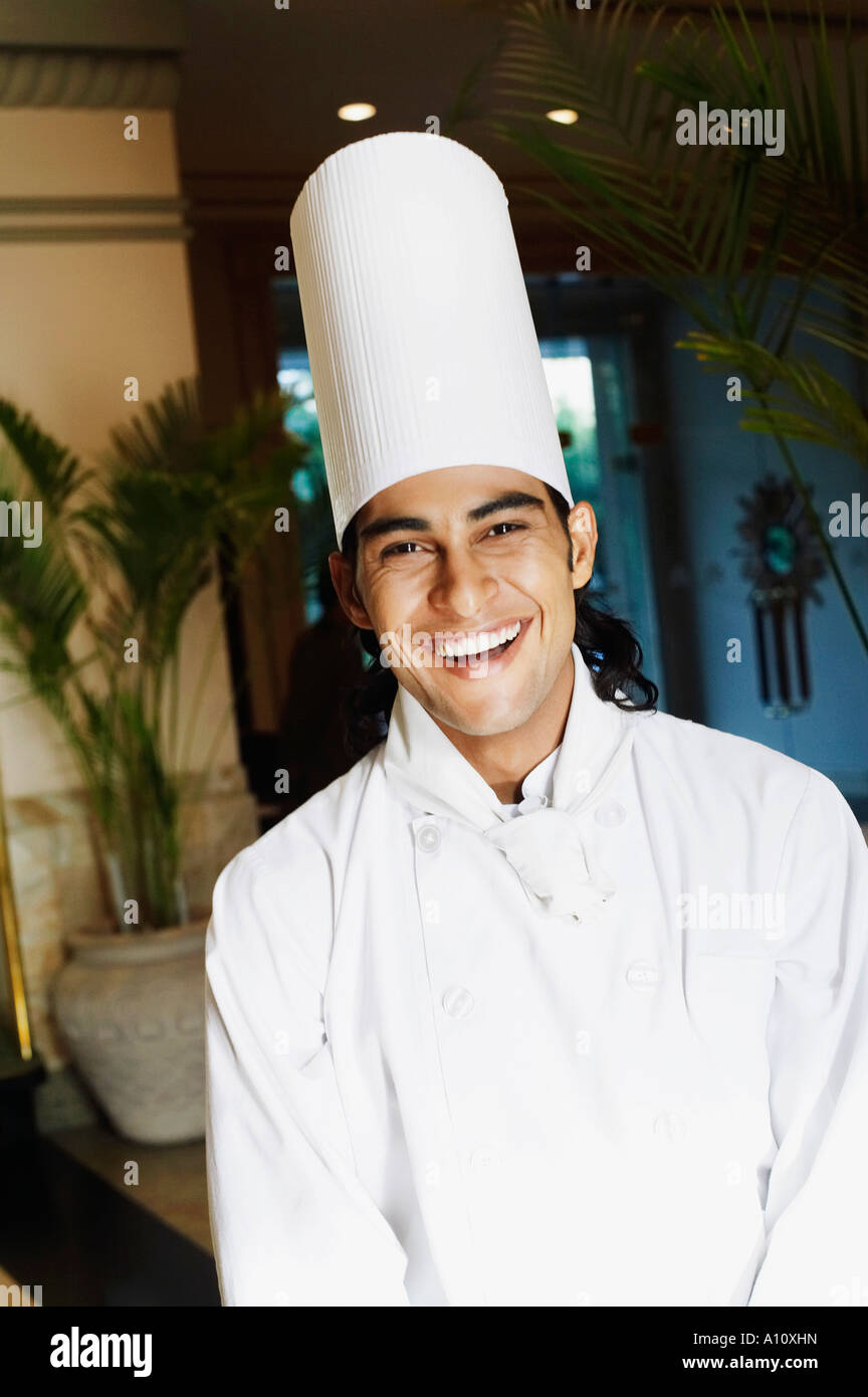 Portrait of a chef smiling Stock Photo - Alamy