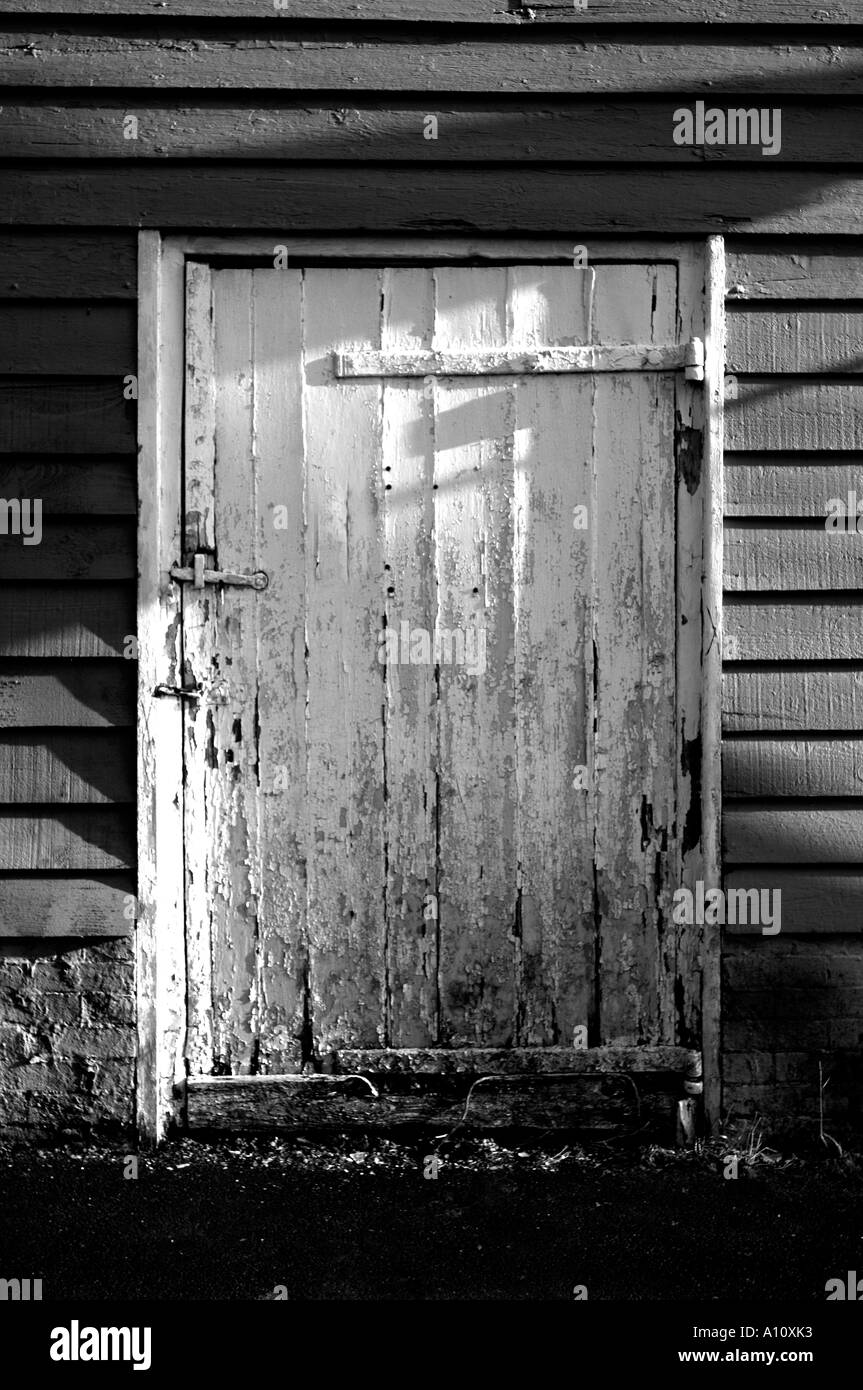 Rotting wooden door in an Old abandoned barn Stock Photo - Alamy
