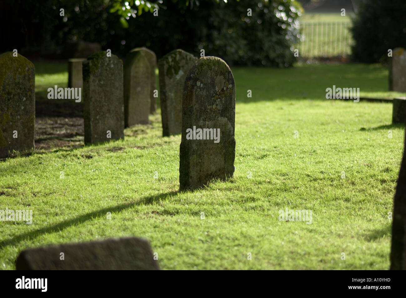 Very old gravestones in a cemetary Stock Photo - Alamy