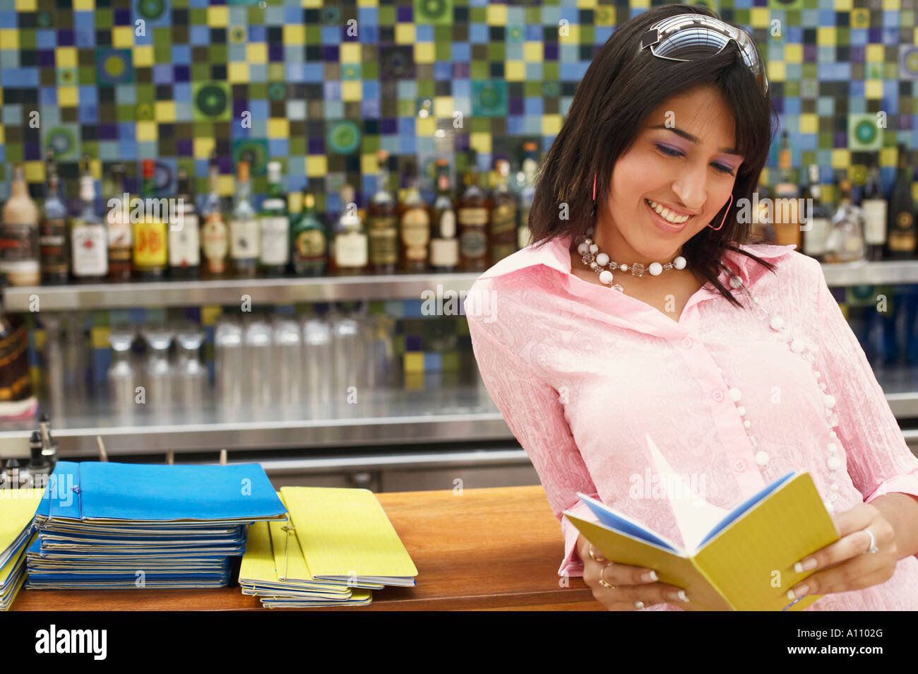 Young beautiful woman reading menu hi-res stock photography and images ...